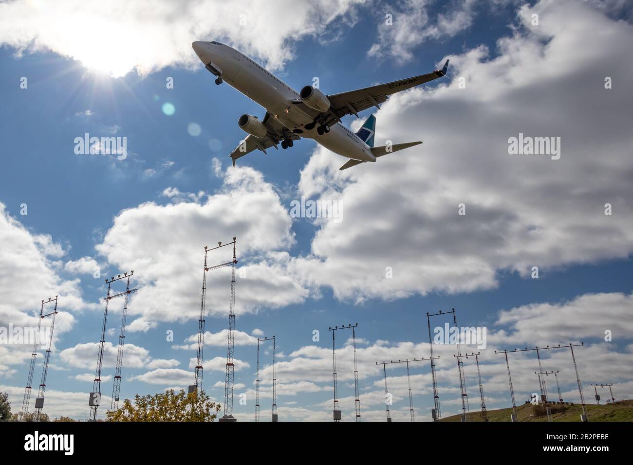 WestJet Airlines Boeing 737-8 landing at Toronto Pearson Intl. Airport ...