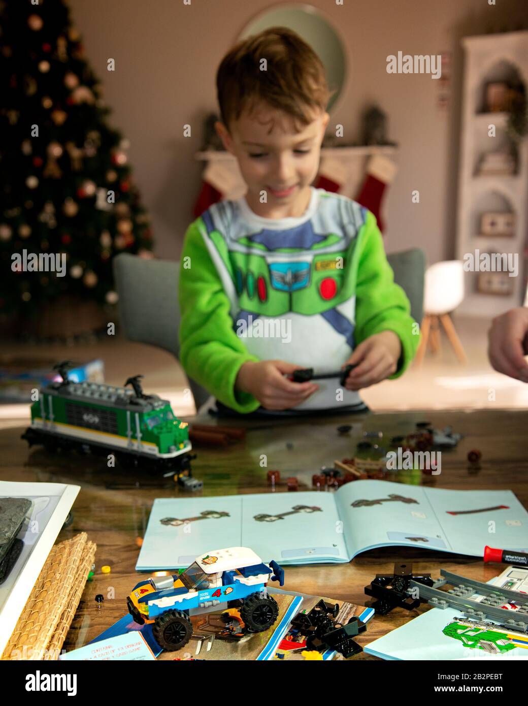 Child following instructions building hi-res stock photography and ...