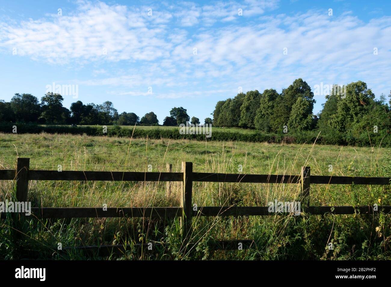 Wooden fence across hill hi-res stock photography and images - Alamy