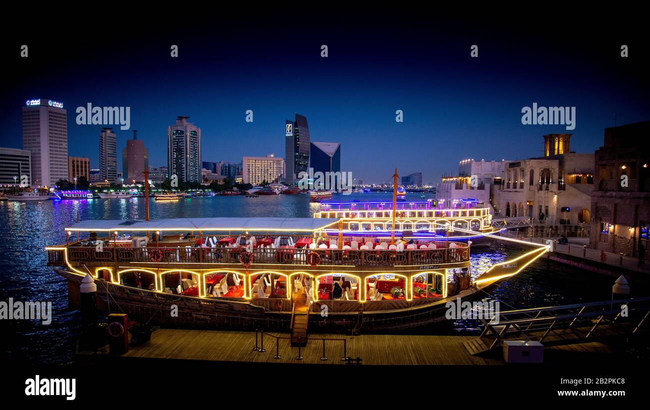 Floating dhow restaurant on Dubai Creek early evening UAE Stock Photo ...