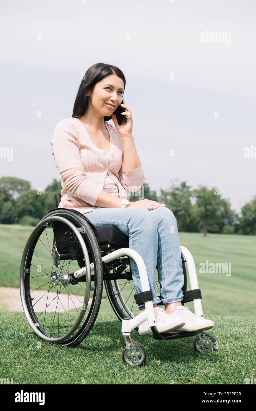 Woman in wheelchair talking on hi-res stock photography and images - Alamy