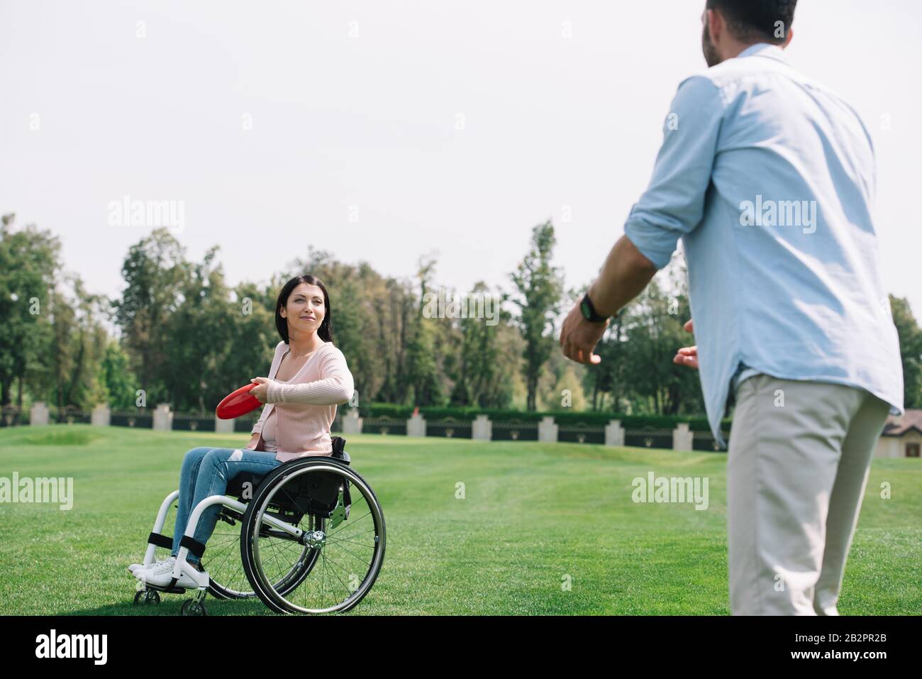 Disabled man in wheelchair throwing hi-res stock photography and images ...