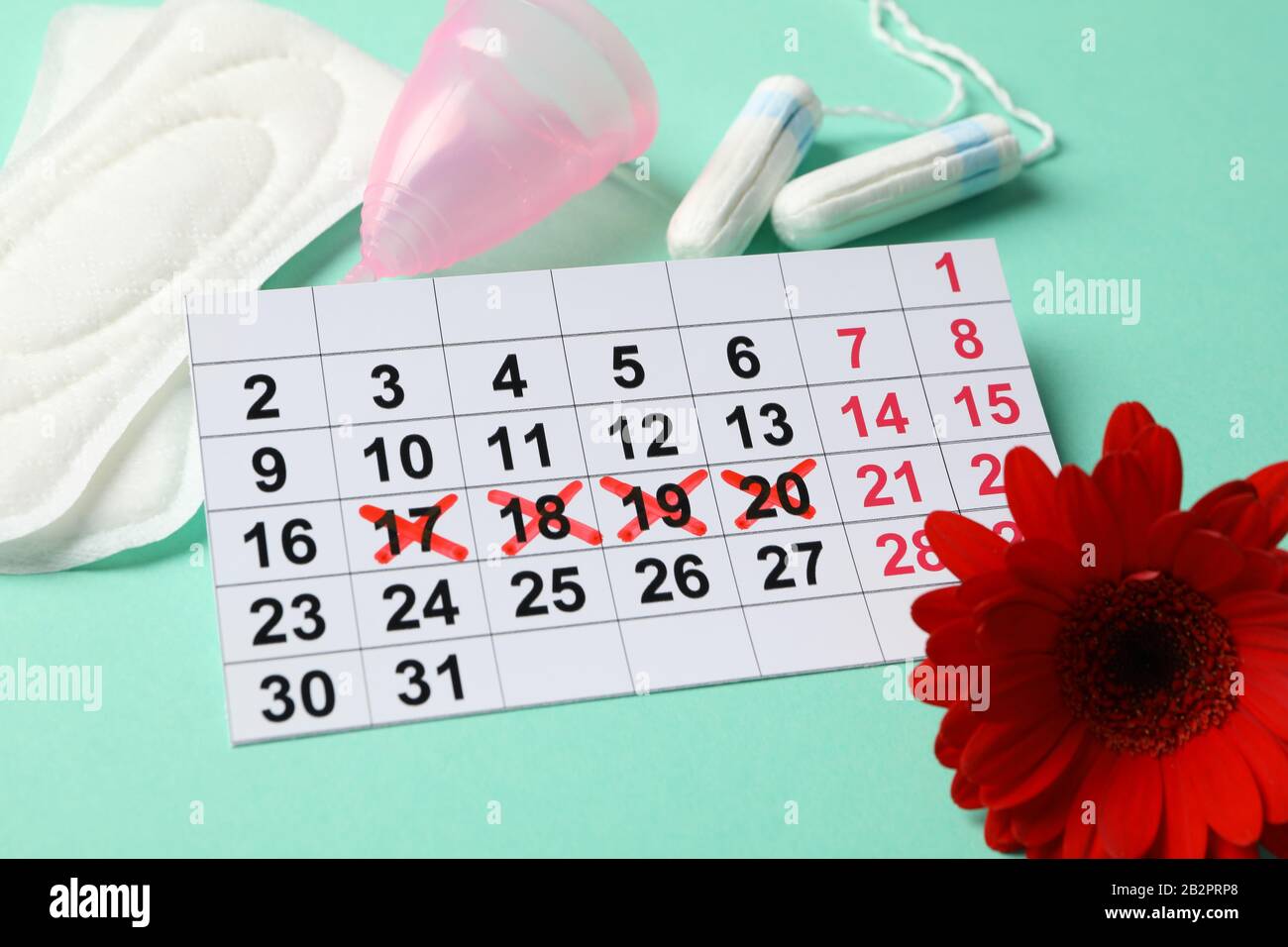 Menstruation period concept on mint background, close up Stock Photo ...
