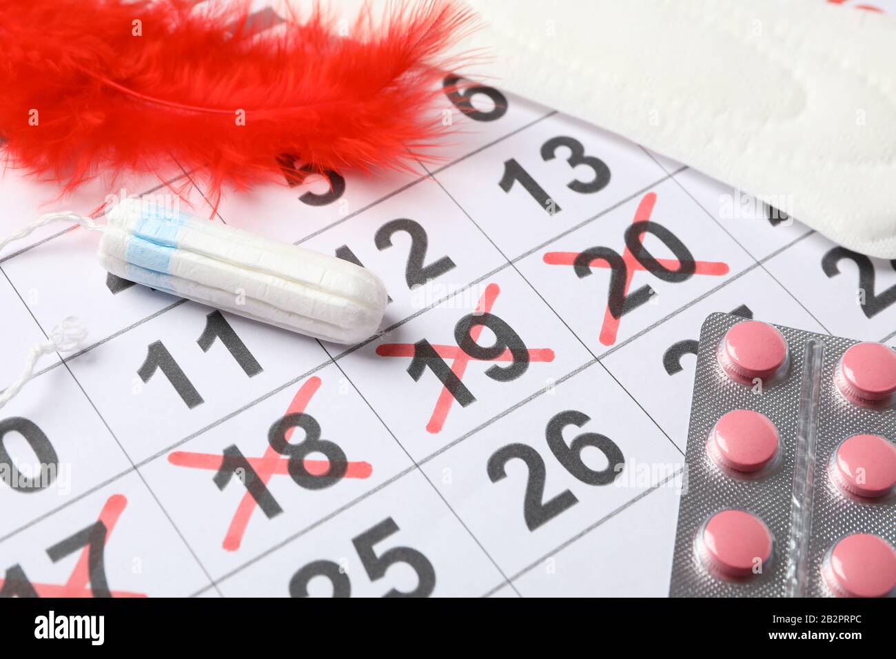 Menstruation period concept with calendar, close up Stock Photo - Alamy