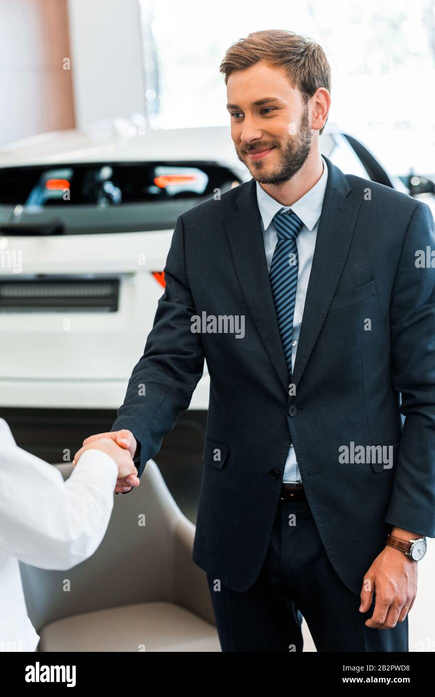 Two hands shaking car in hi-res stock photography and images - Alamy