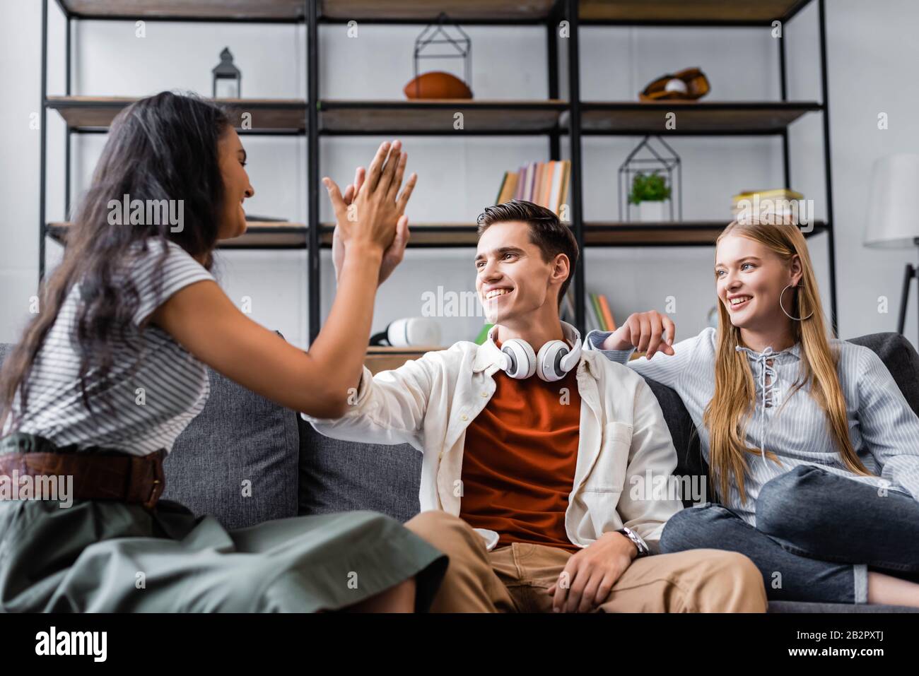 Multicultural high five hi-res stock photography and images - Alamy