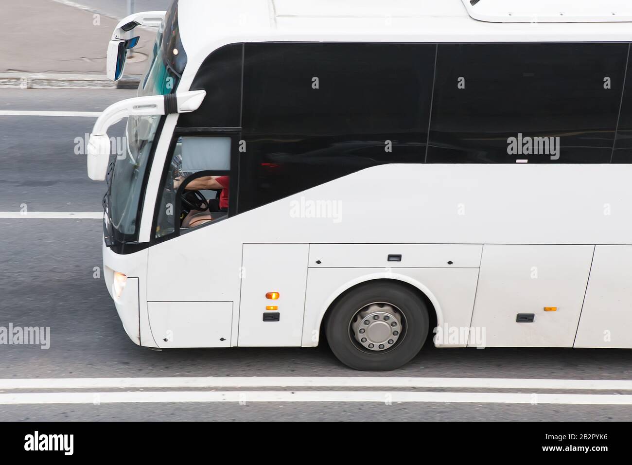 tourist bus at the city intersection Stock Photo - Alamy