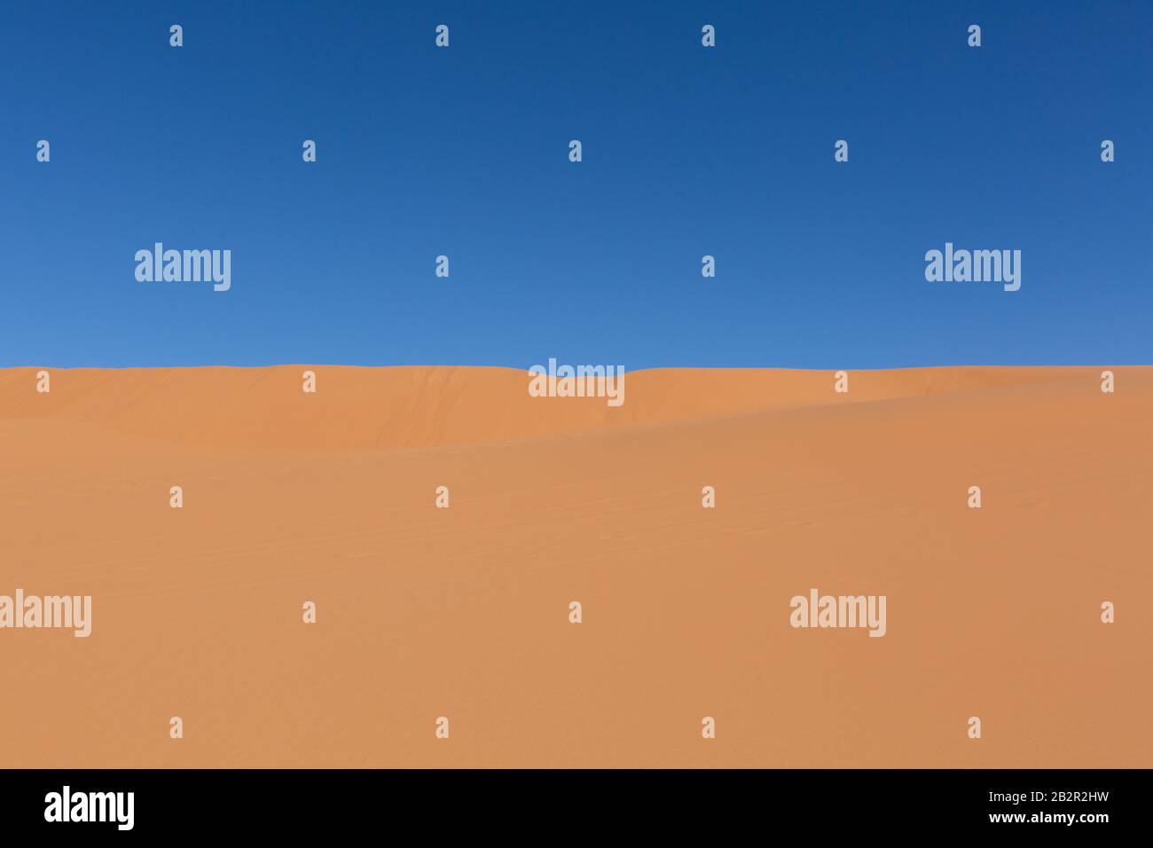Sand dune and blue sky without clouds. Sahara Desert, Morocco. Travel ...