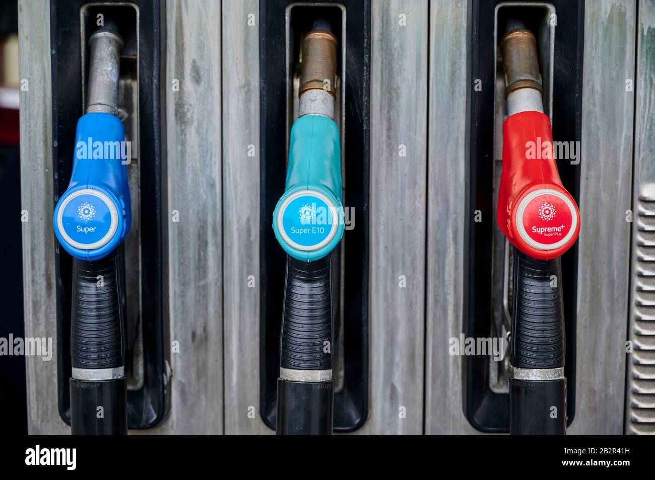 Berlin, Germany - September 16, 2019: Three gas pump nozzles for ...