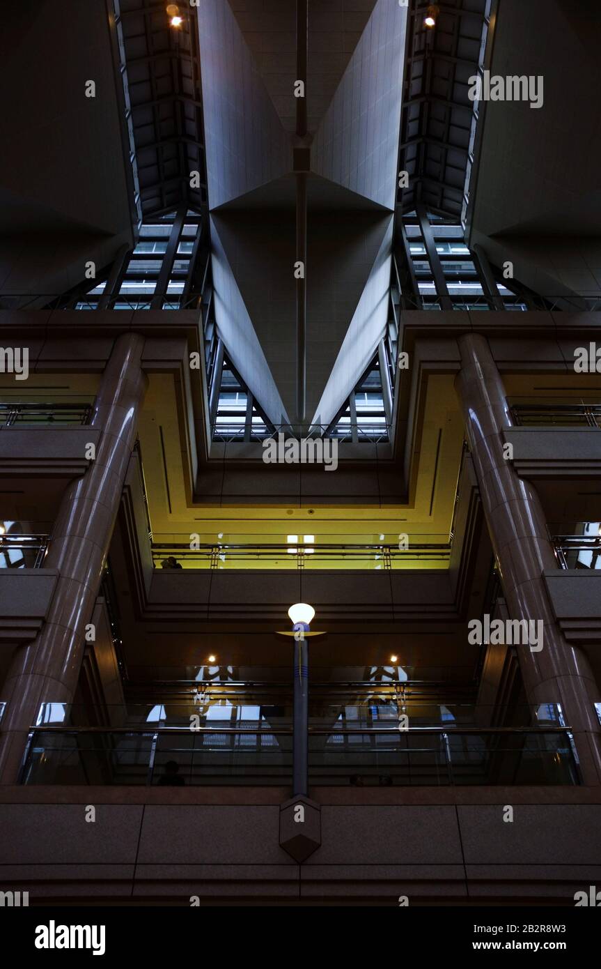 Vertical shot inside the shopping mall in Japan with modern ...