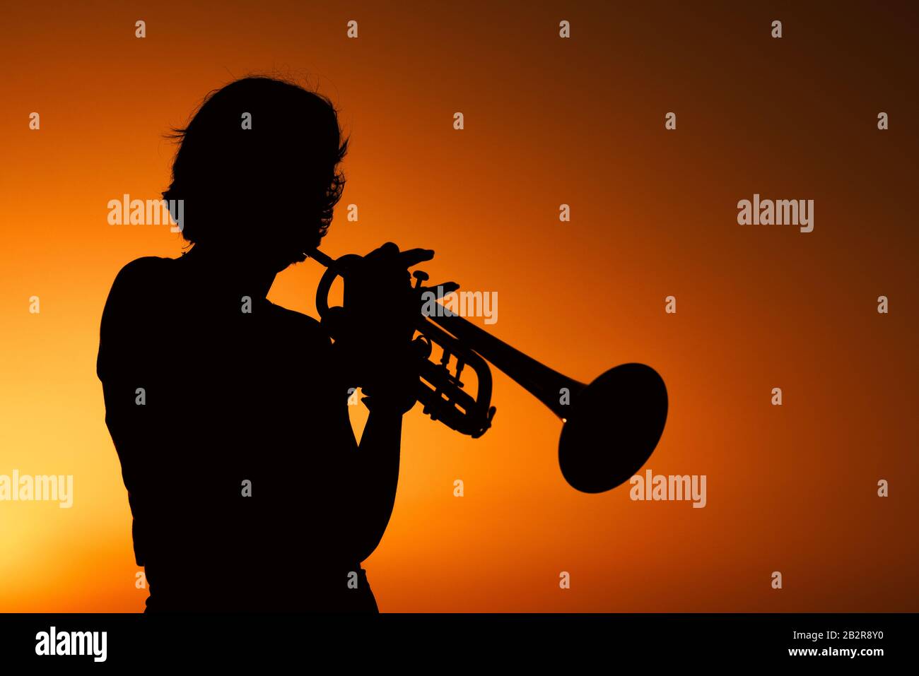 Silhouette musician playing trumpet hi-res stock photography and images ...