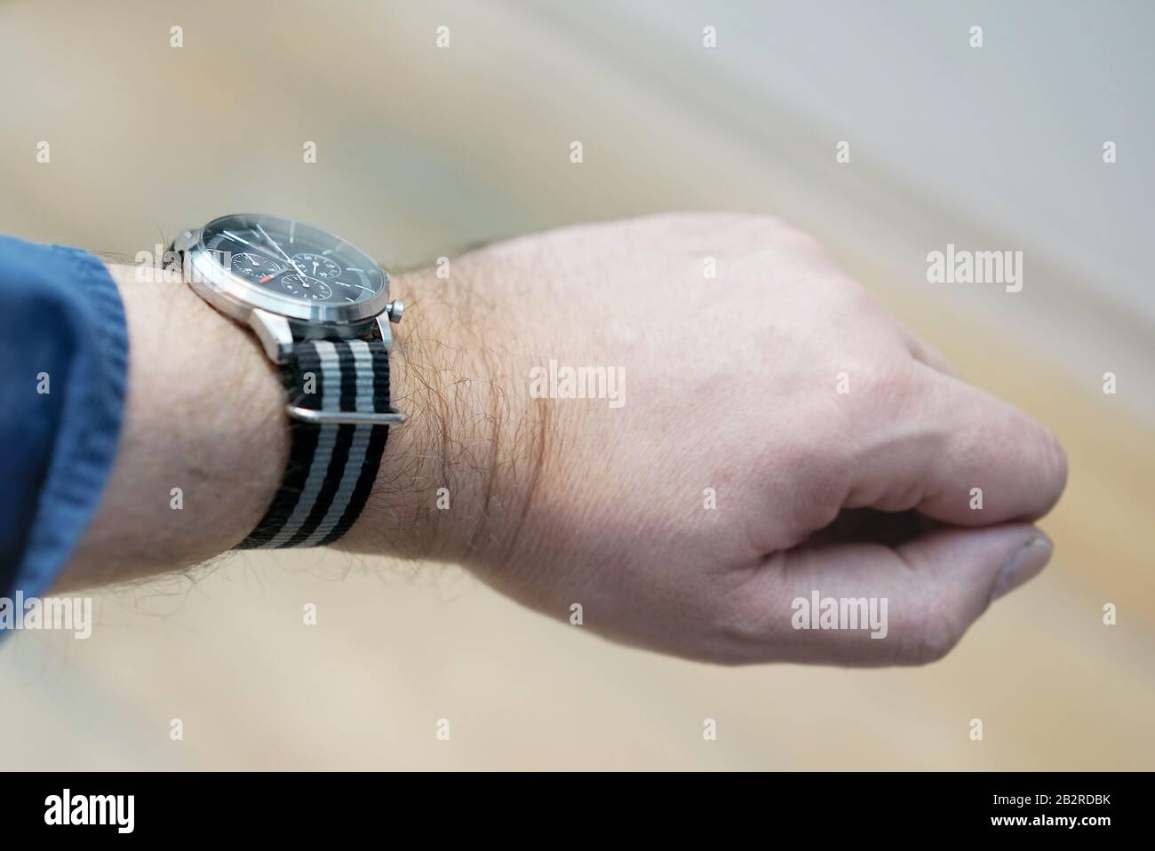 classic men's watch on the wrist Stock Photo - Alamy