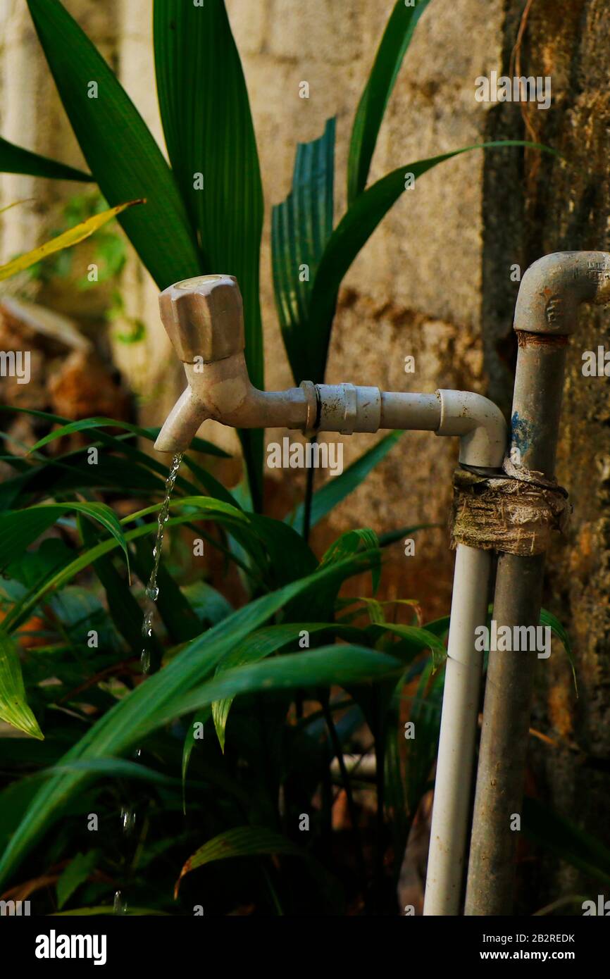 Water wasting from tap hi-res stock photography and images - Alamy