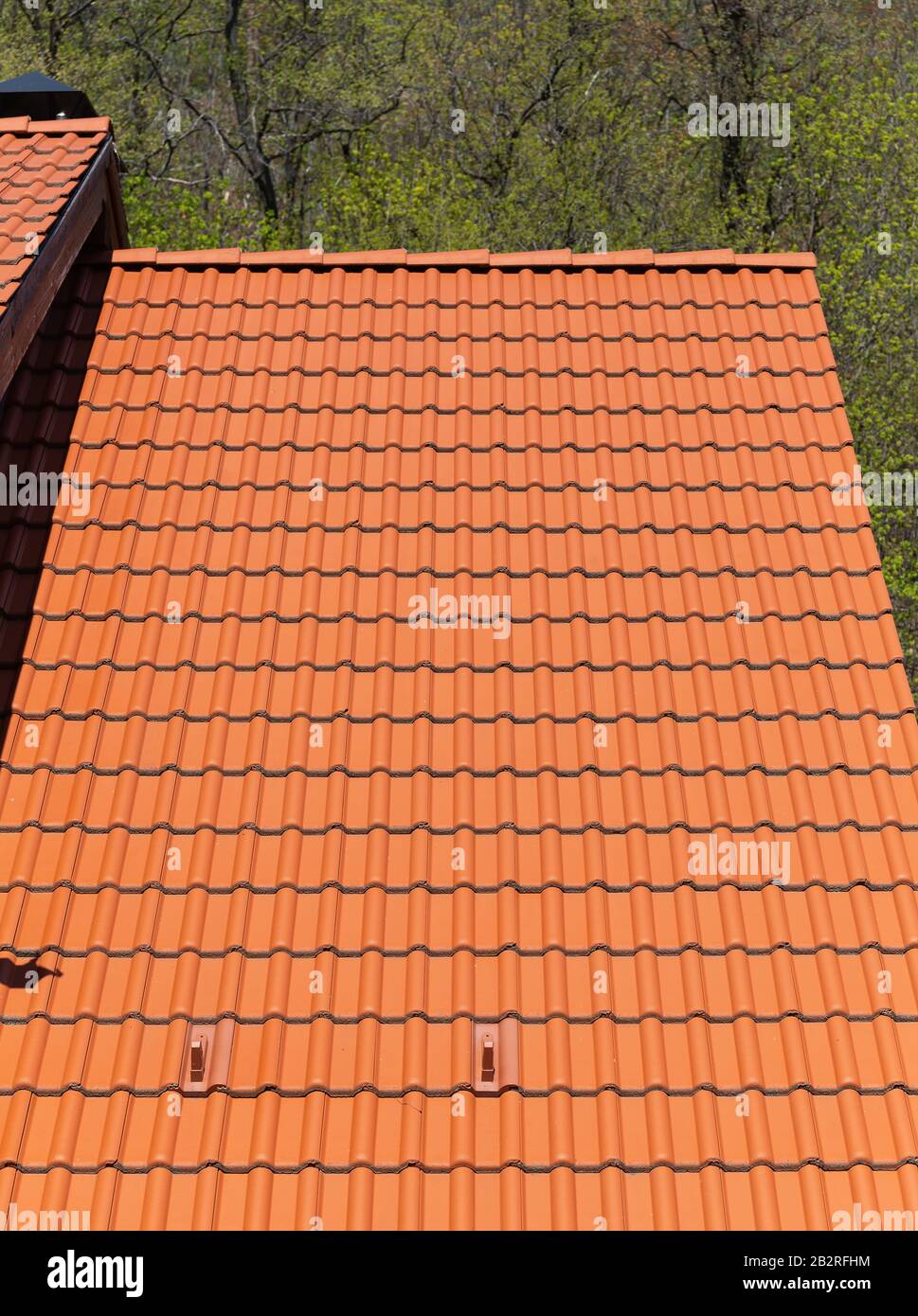 modern tiled roof for a country house Stock Photo - Alamy
