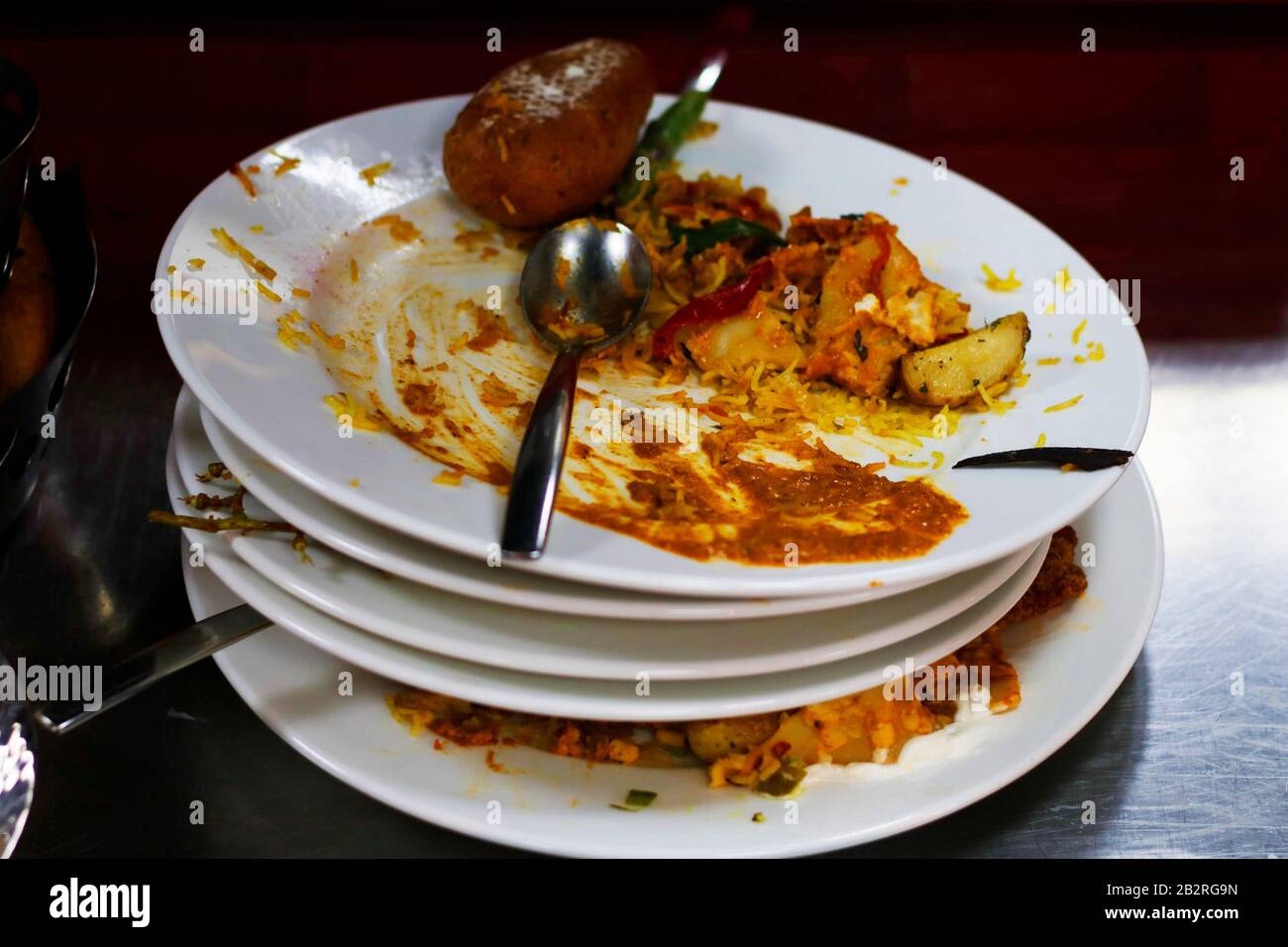 food wastage, left over food after in a plate after the meal. nprmally ...