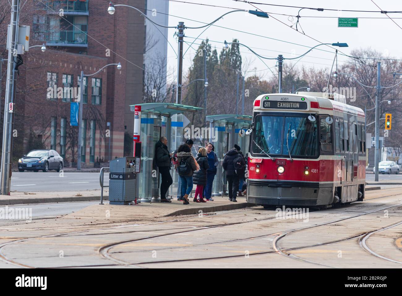 TTC (Toronto Transit Commission) CLRV streetcar at a stop as passengers ...