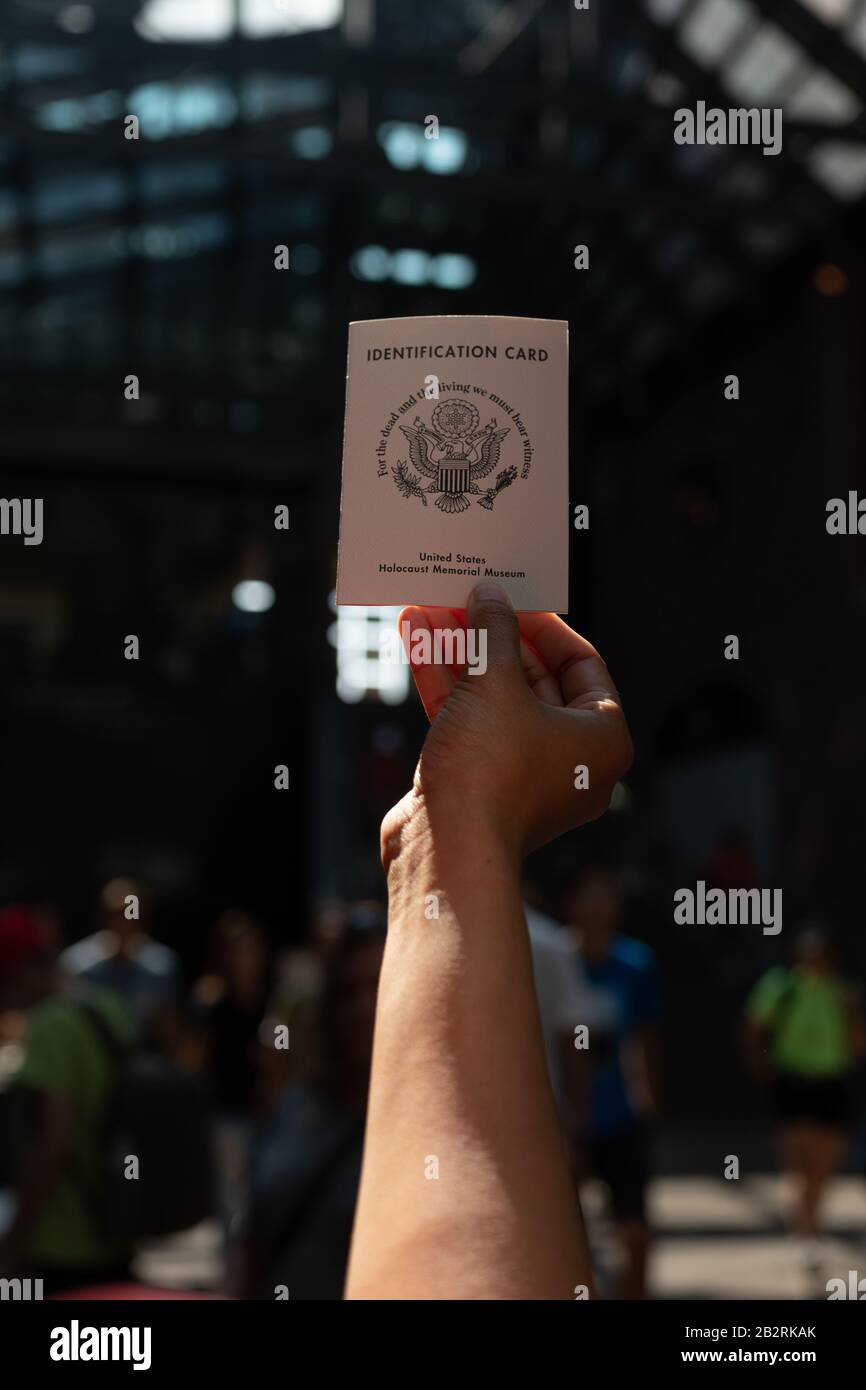 WASHINGTON, DC, UNITED STATES - Jun 13, 2019: Hand holding up an ...