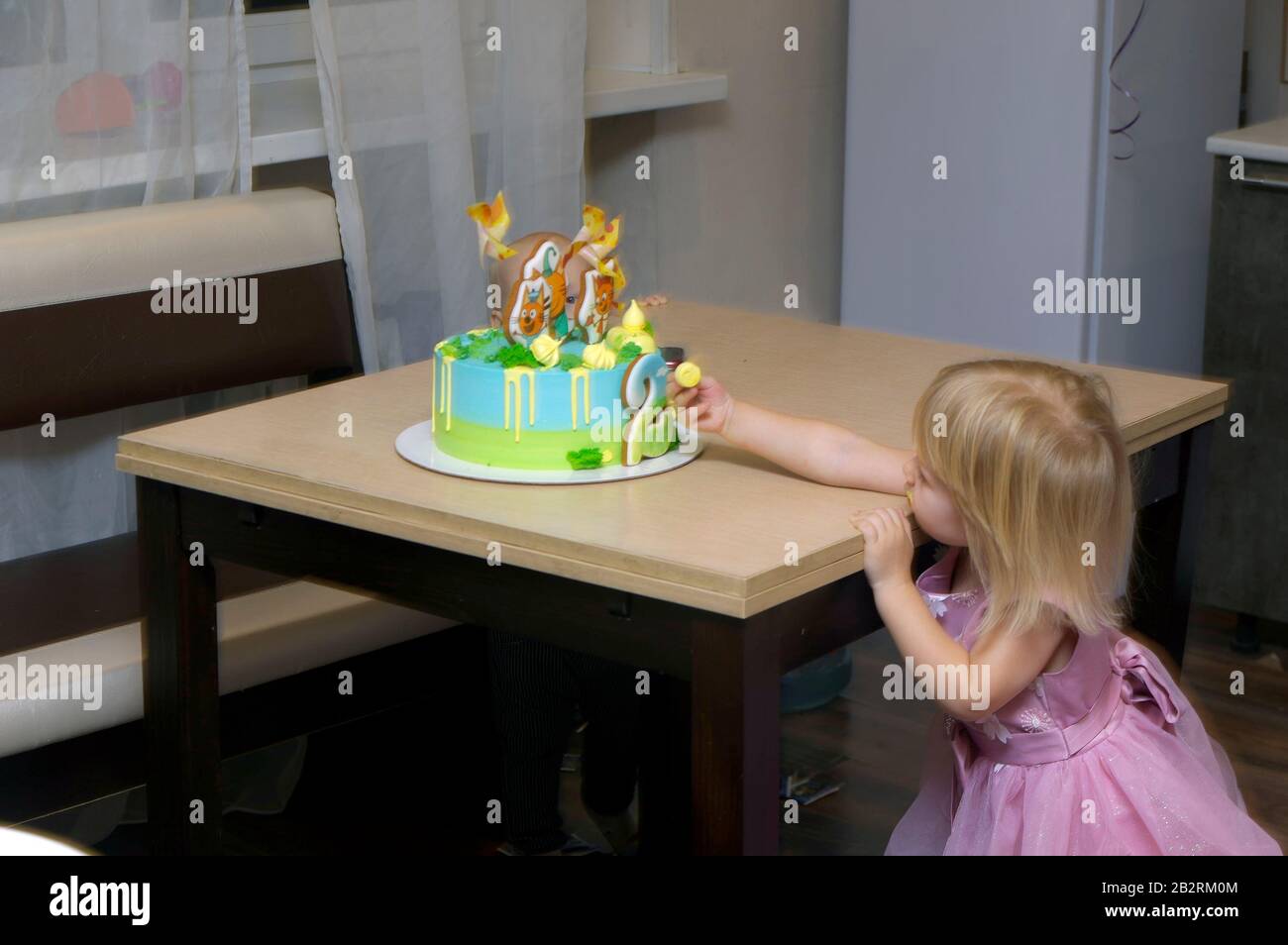 Baby eating messy chocolate cake hi-res stock photography and images ...
