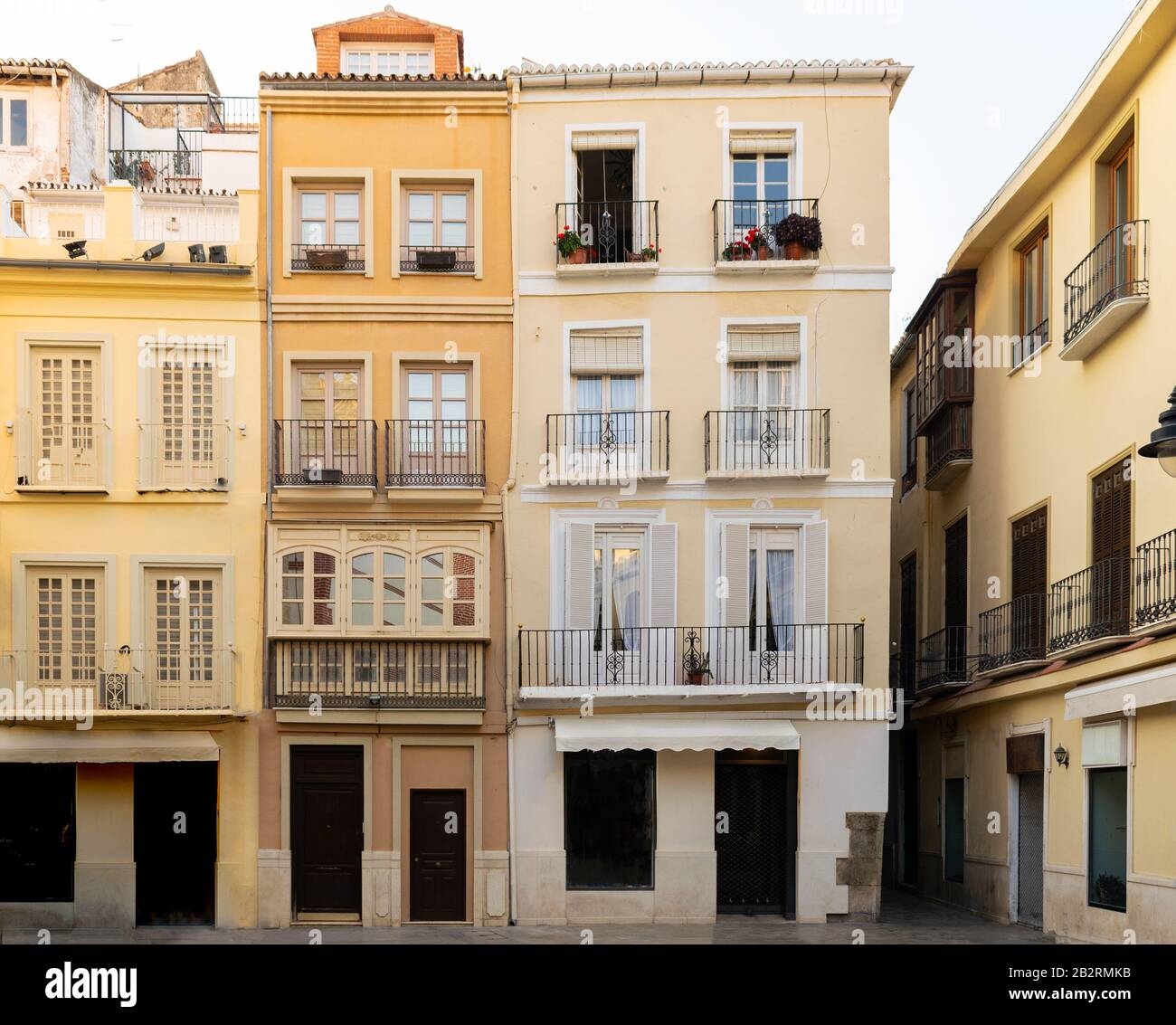 Square and buildings with typical mediterranean style architecture in ...