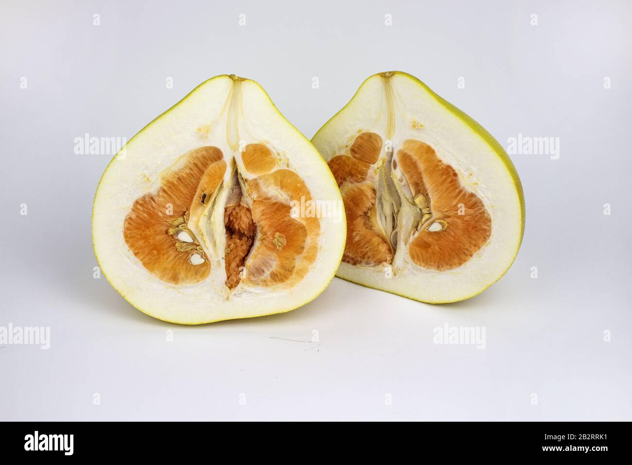 Pamela fruit on a white background. Copyspace Stock Photo - Alamy