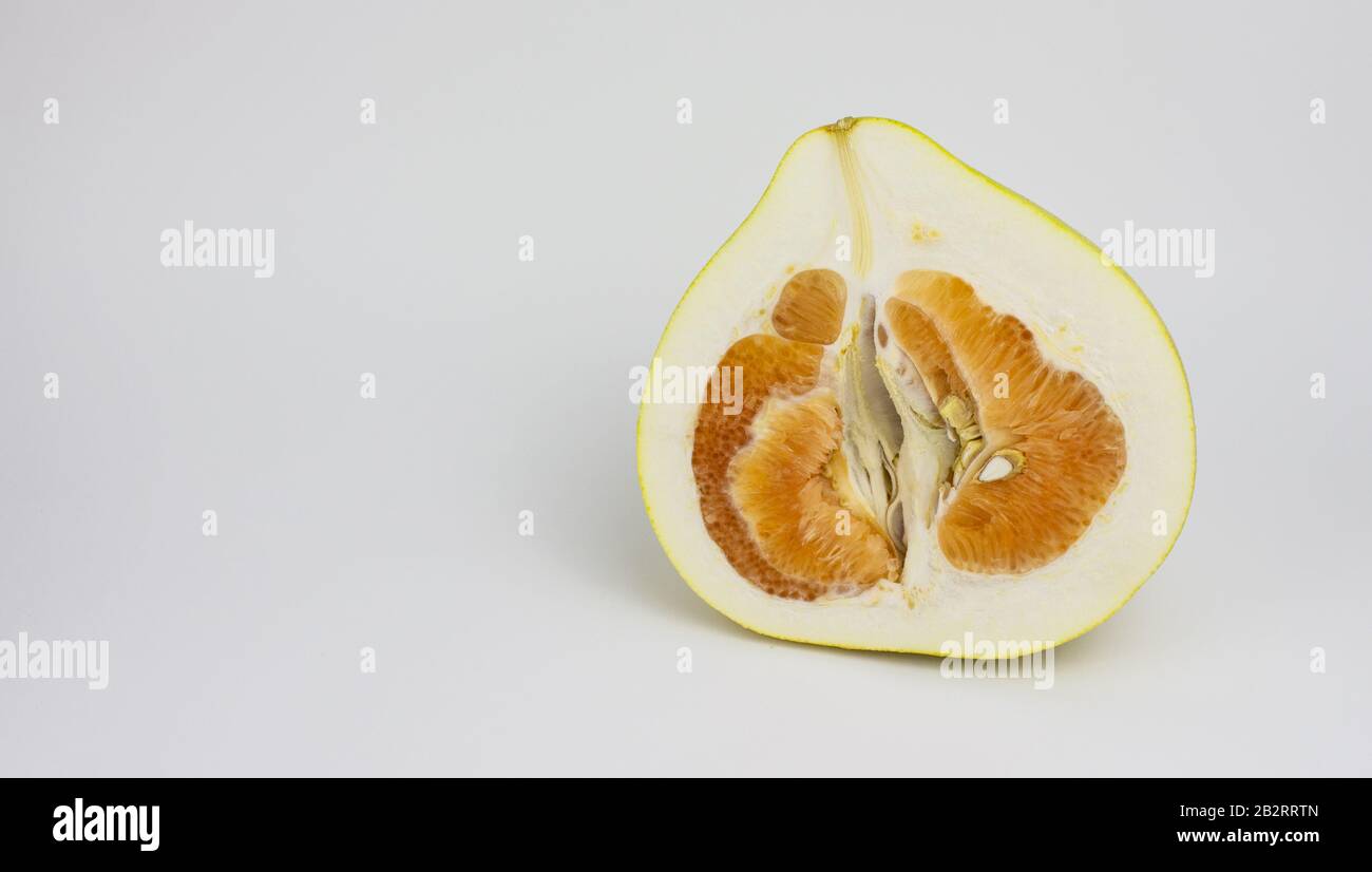 Pamela fruit on a white background. Place for text Stock Photo - Alamy