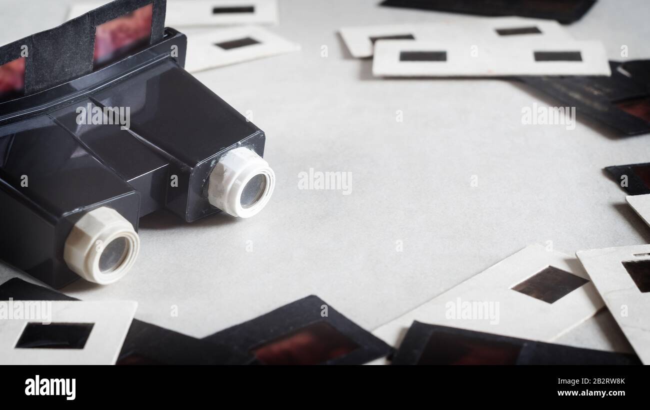 Outdated stereoscope with a stereo diapositiv cards. 3D viewing device ...