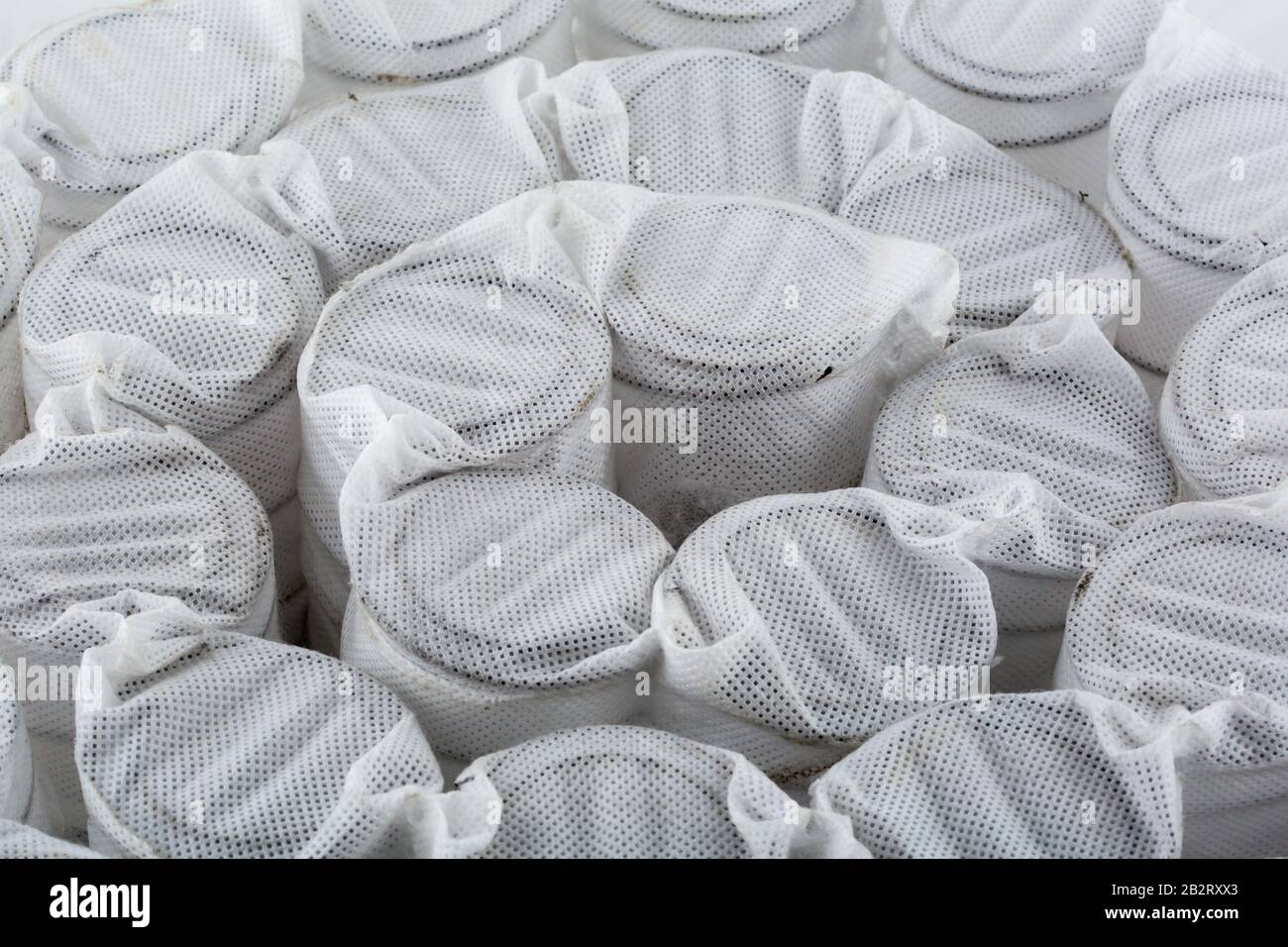 Independent mattress springs in spunbond Stock Photo - Alamy