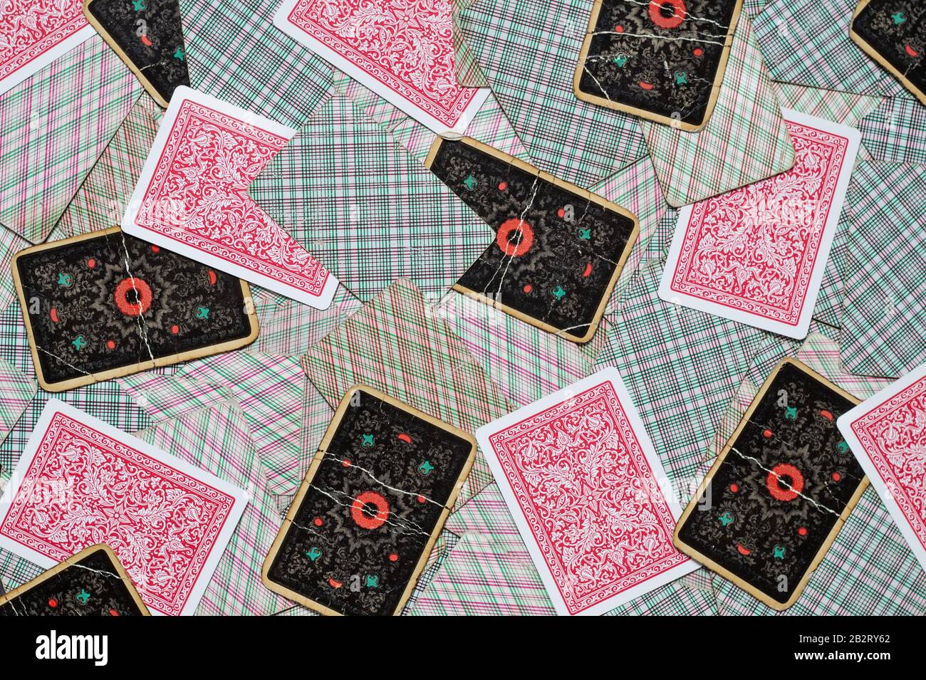 Background of various scattered old playing cards face down Stock Photo ...