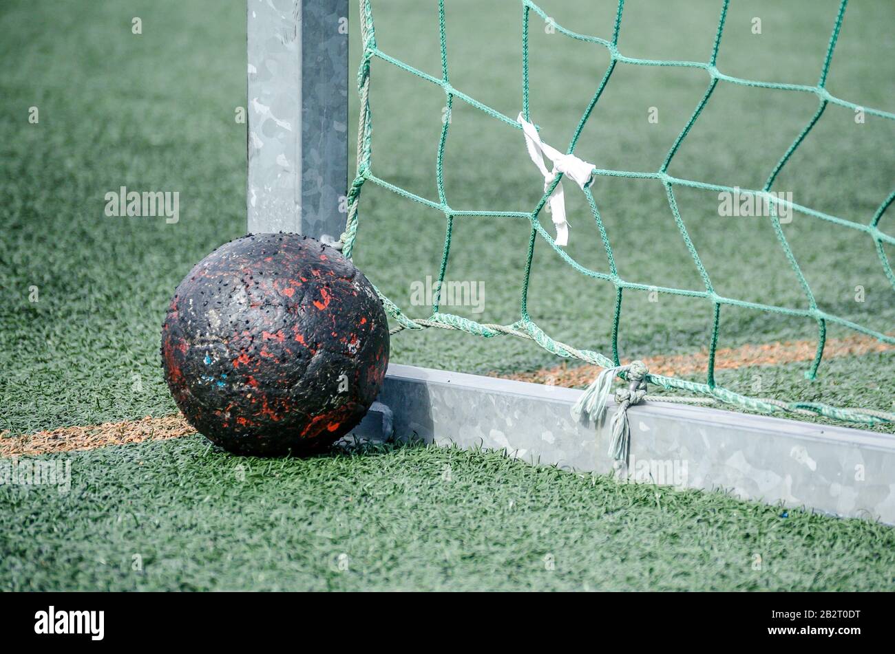 Old dirty handball near a handball goal during daytime Stock Photo - Alamy