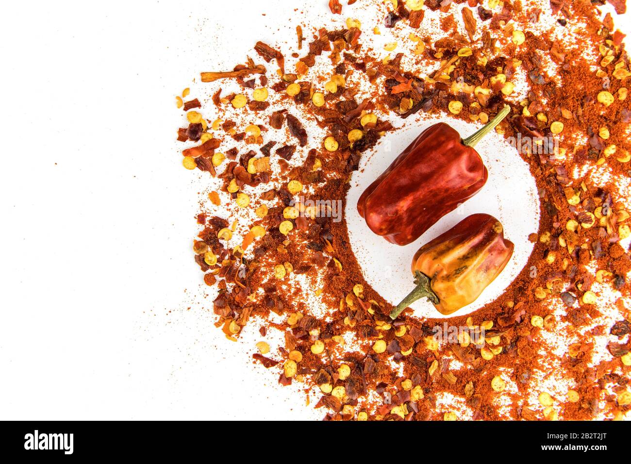 Hot spice. Chilli powder. Dried chili. Healthy spices. Spilled chili on ...