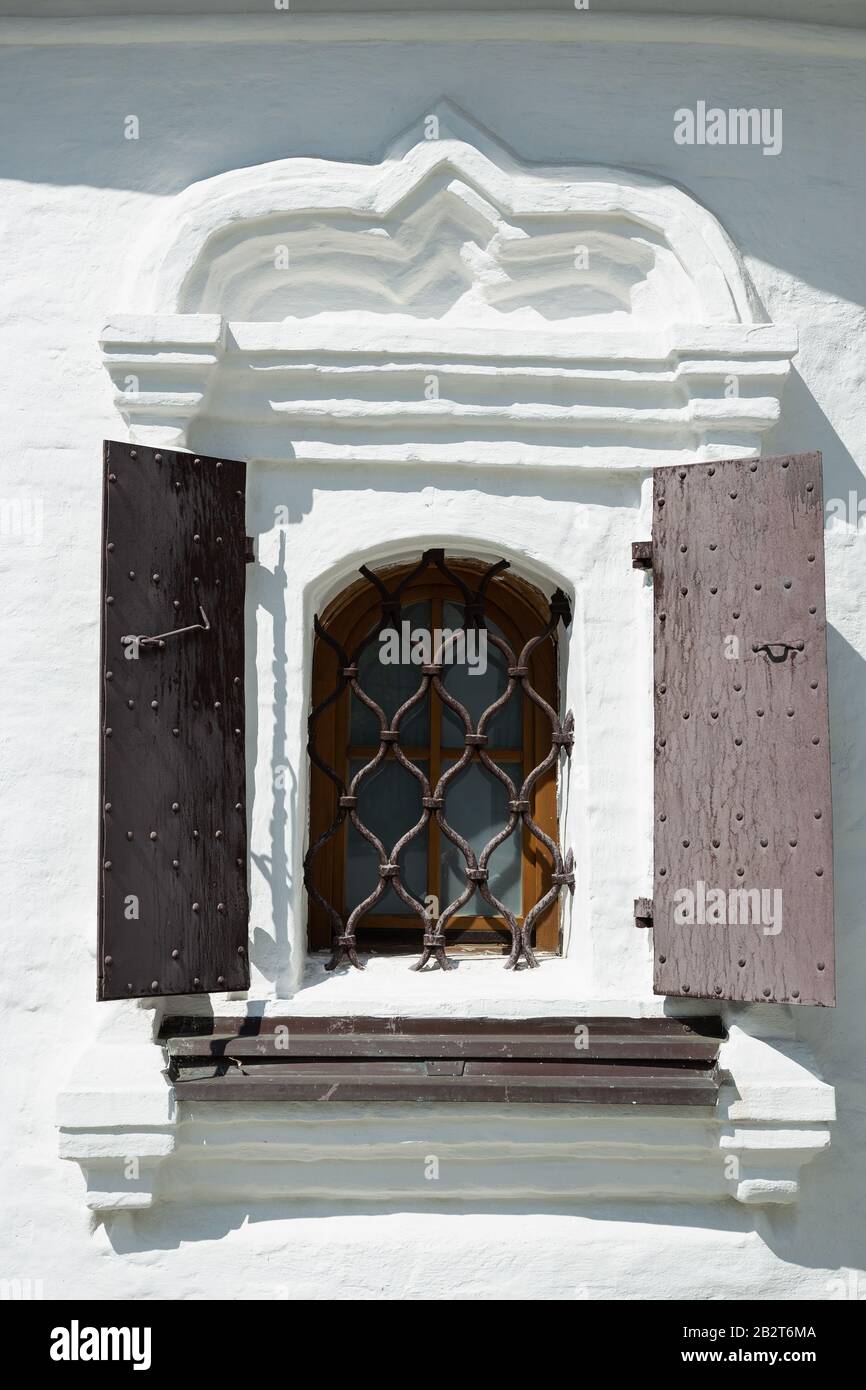 Old window in the stone wall of the monastery Stock Photo - Alamy