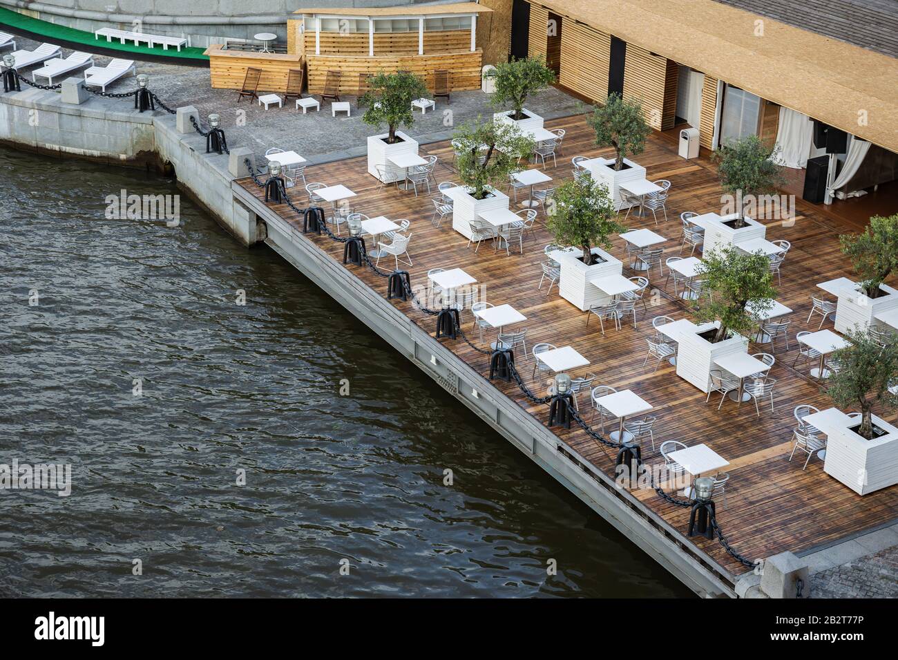 Street cafe on the embankment of the river Stock Photo - Alamy