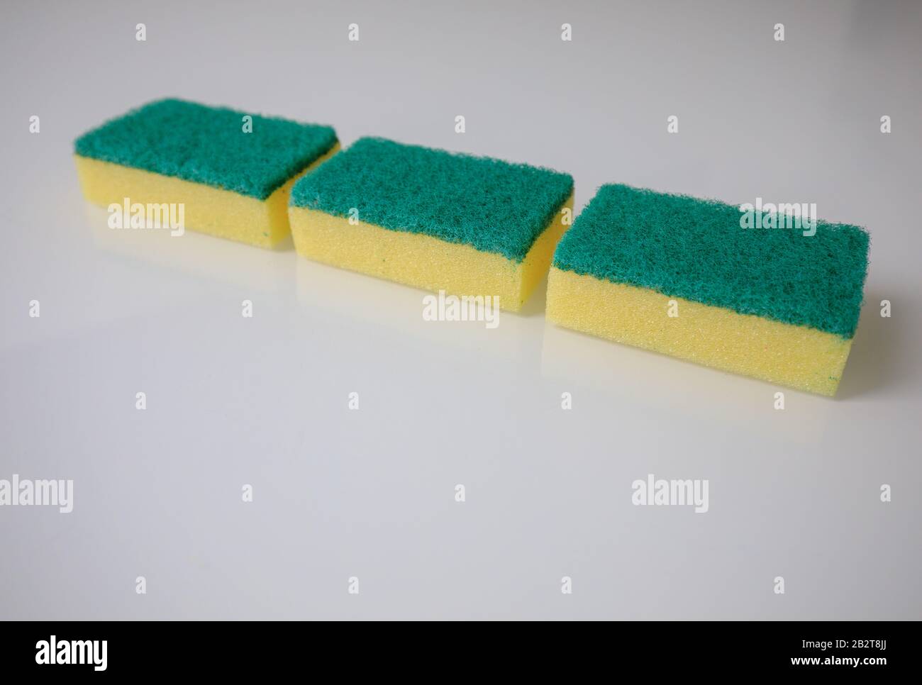 Yellow green cleaning sponge isolated on white background - Spring ...