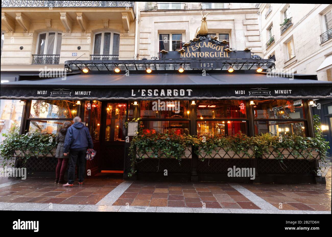 A traditional French restaurant Escargot located at Montorgueil street ...