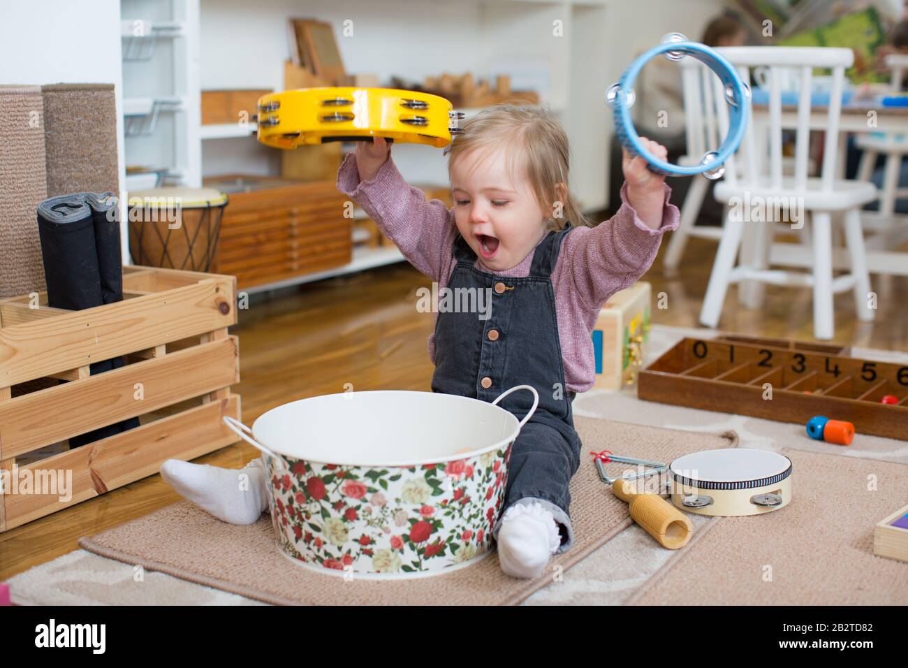 Toddler girl playing with play doh hi-res stock photography and images ...