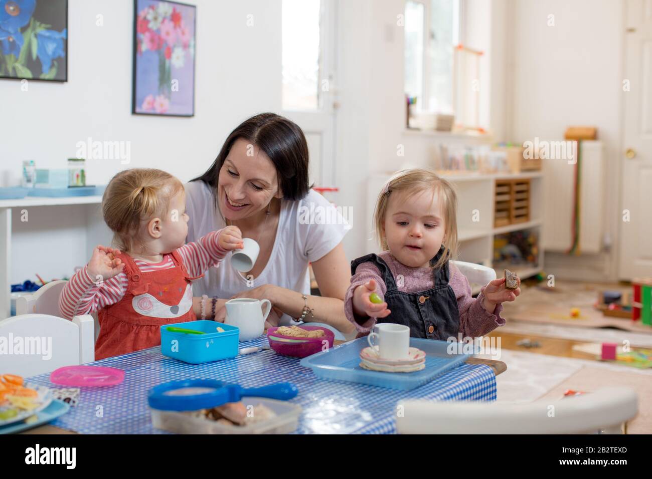 Nursery school children playing pretend hi-res stock photography and ...