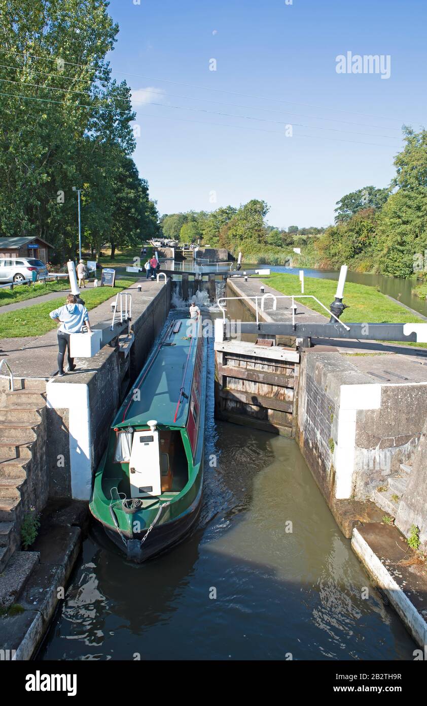 Narrowboat passing through locks hi-res stock photography and images ...