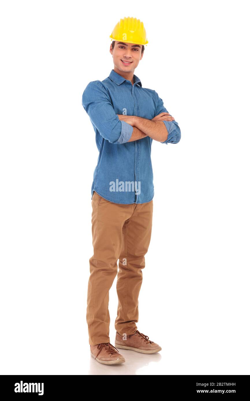 full body picture of a young construction engineer with arms folded ... full body picture of a young construction engineer with arms folded ...