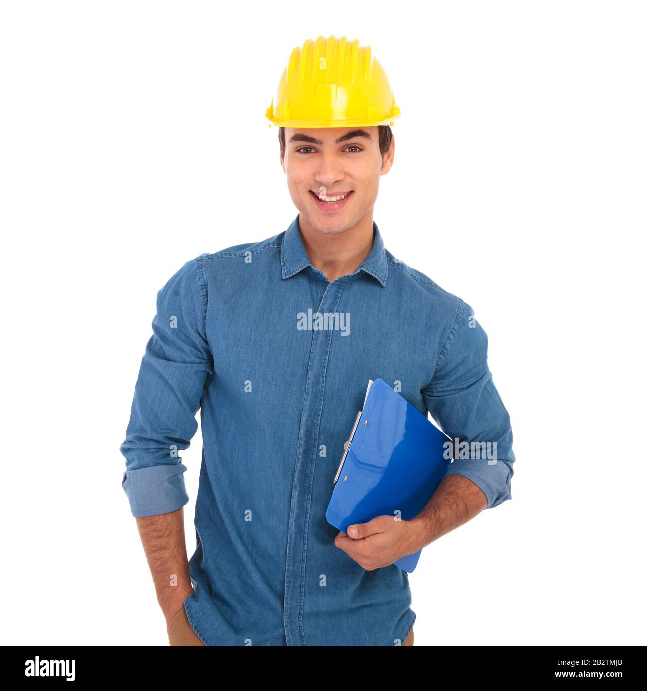 happy construction engineering student holding clipboard is smiling on ...