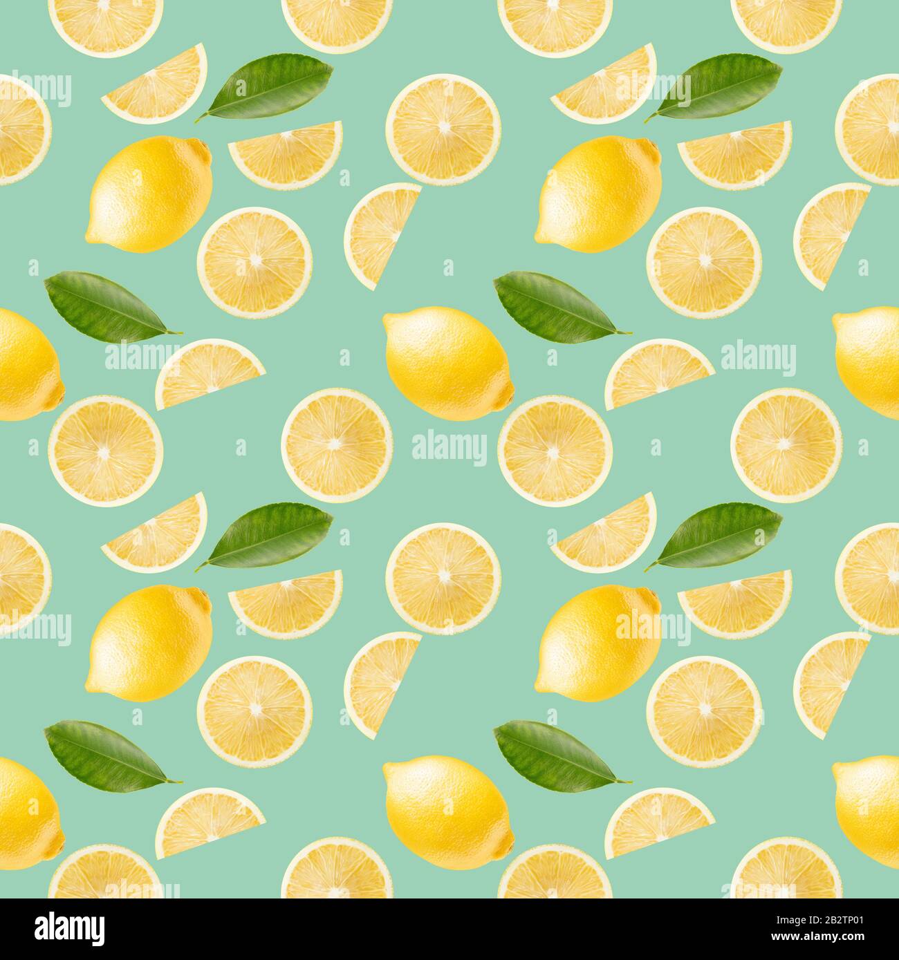 pattern with lemon slices and leaves on a light green background Stock ...
