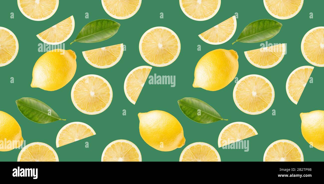 pattern with lemon slices and leaves on a green background Stock Photo ...