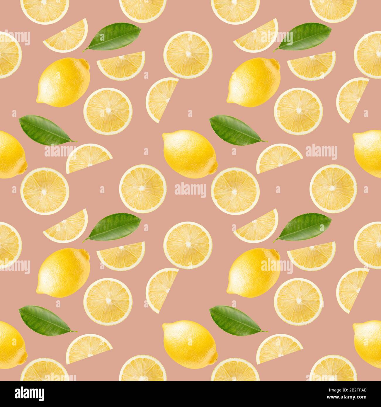 pattern with lemon slices and leaves on a light pink background Stock Photo - Alamy