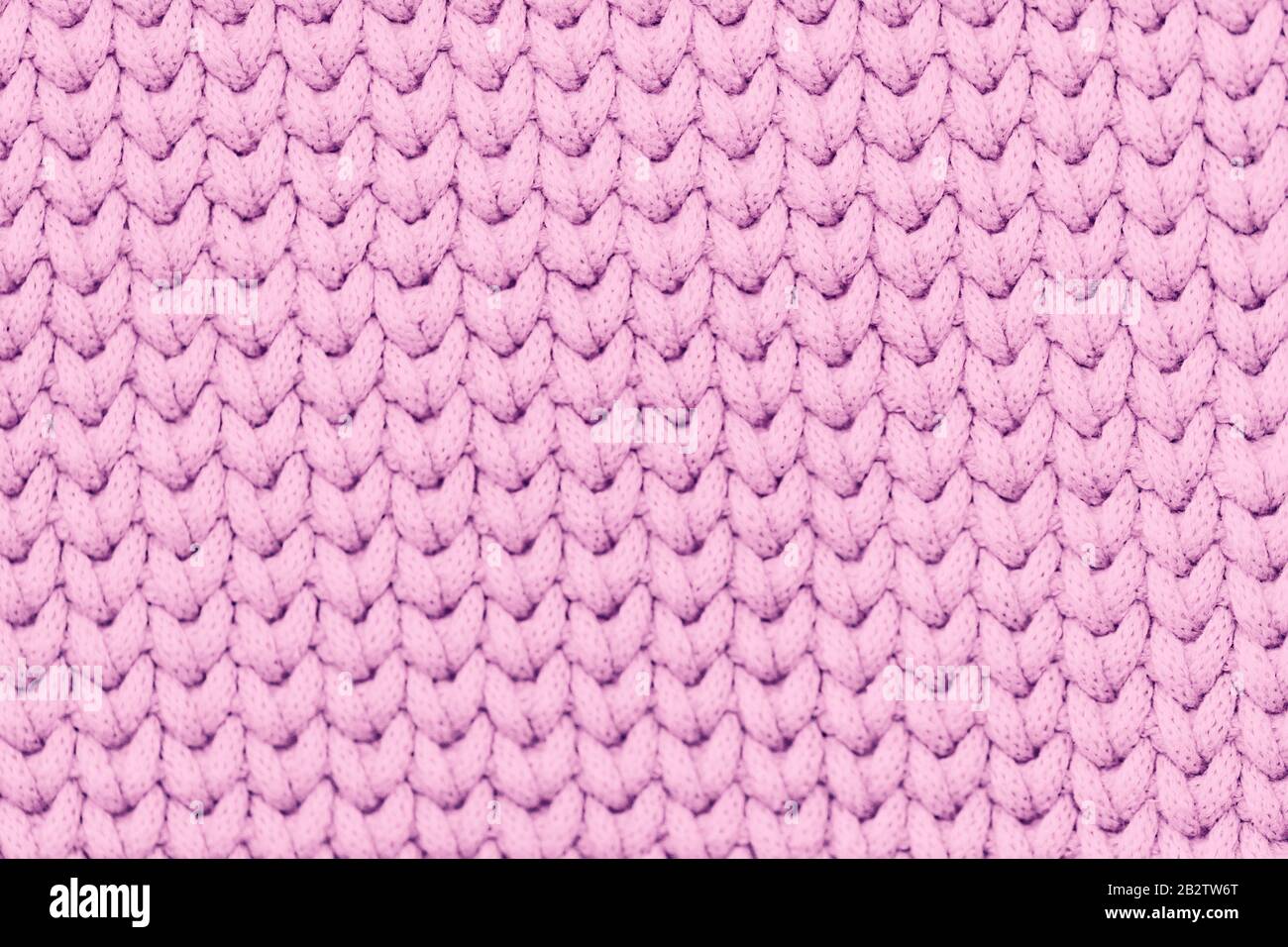 Light pink knitted fabric soft texture background Stock Photo - Alamy