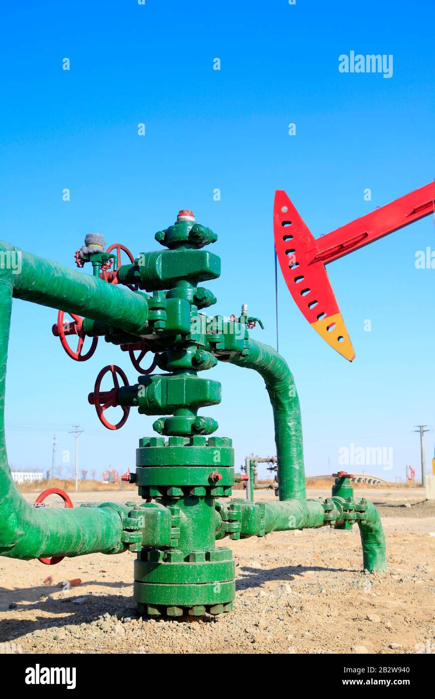 Oil field scene, Oil pipeline and pumping unit Stock Photo - Alamy