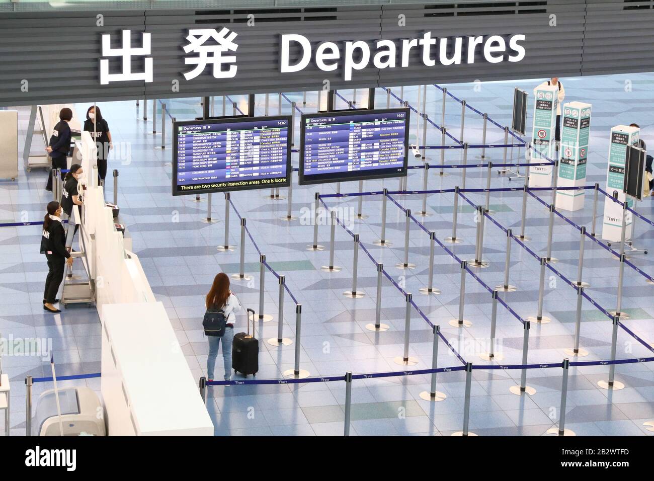 A departure gate is almost empty at the international terminal of Tokyo ...