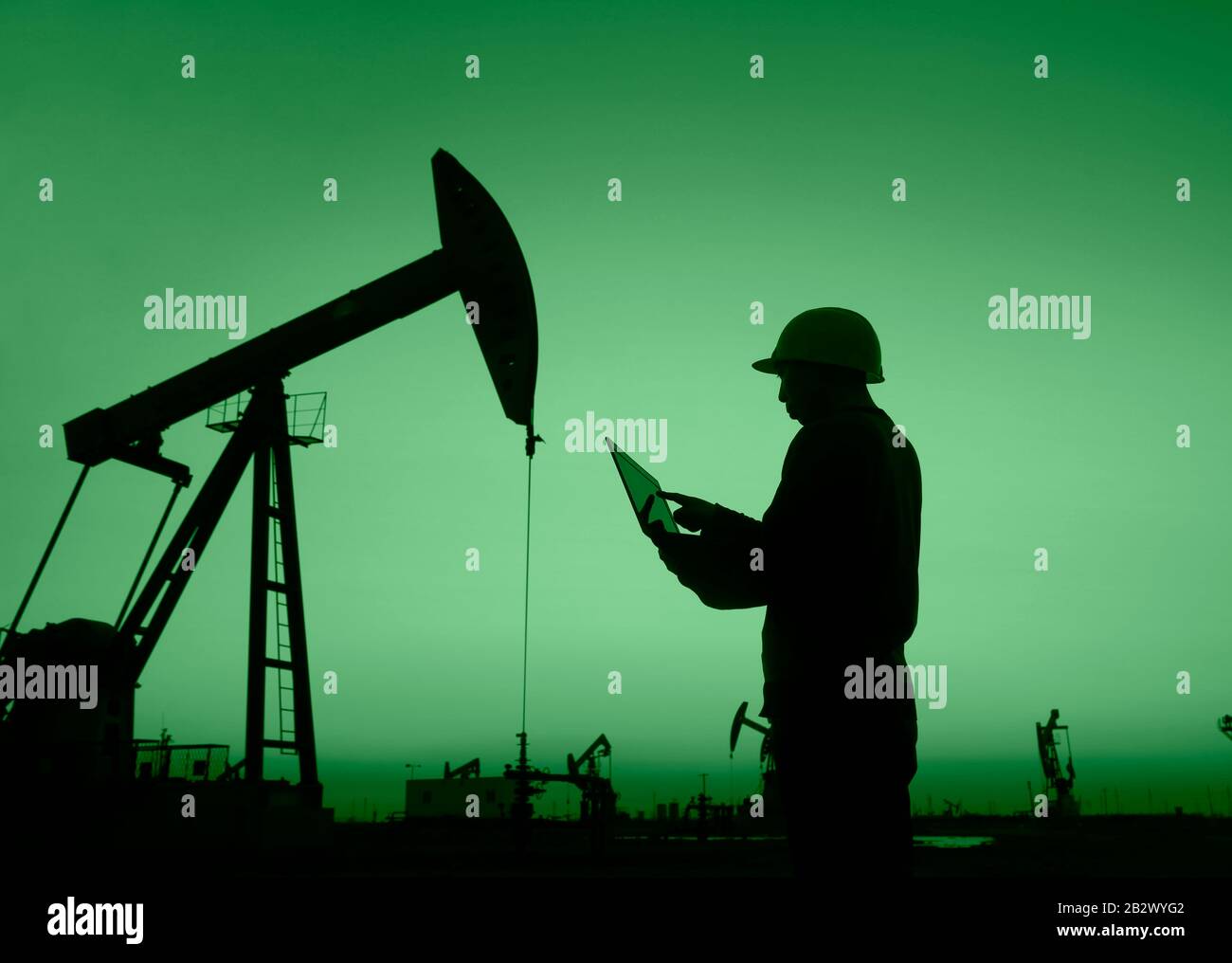 oil field, the oil workers are working Stock Photo - Alamy