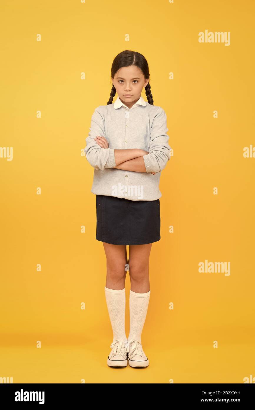 in bad mood. unhappy girl in school uniform. education concept. back to ...