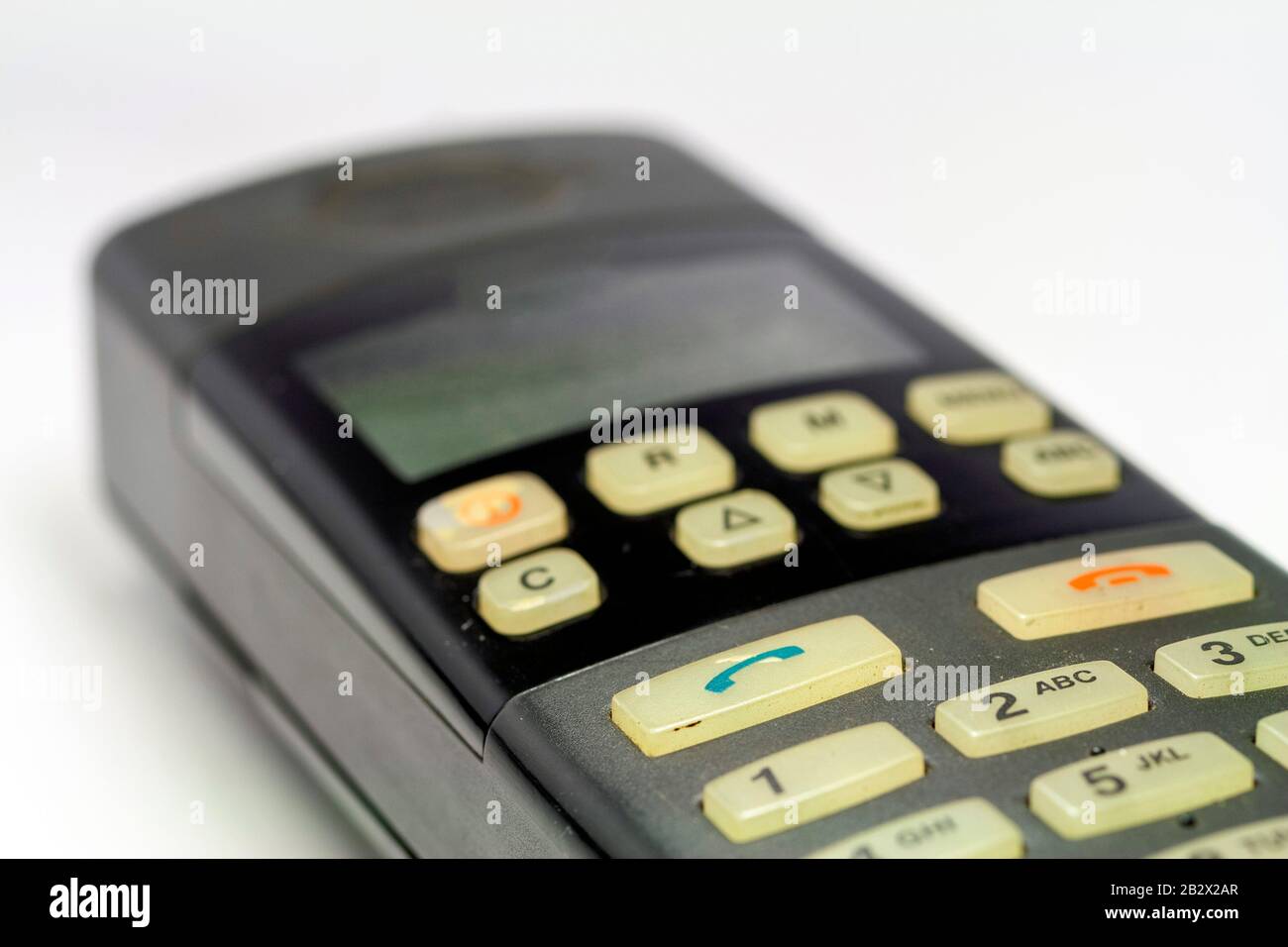 Old mobile phone on white background Stock Photo - Alamy