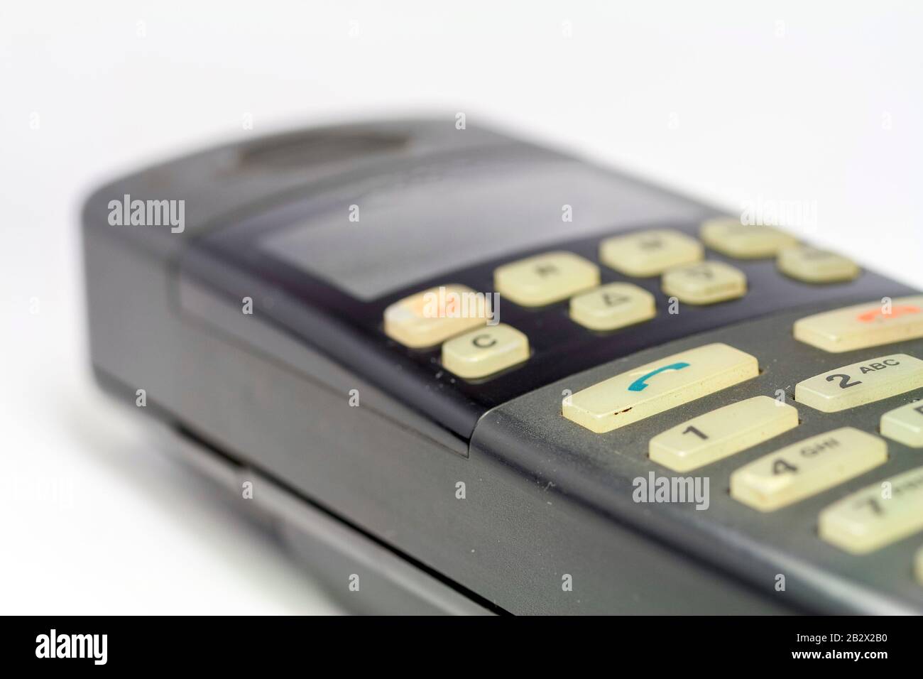 Old mobile phone on white background Stock Photo - Alamy