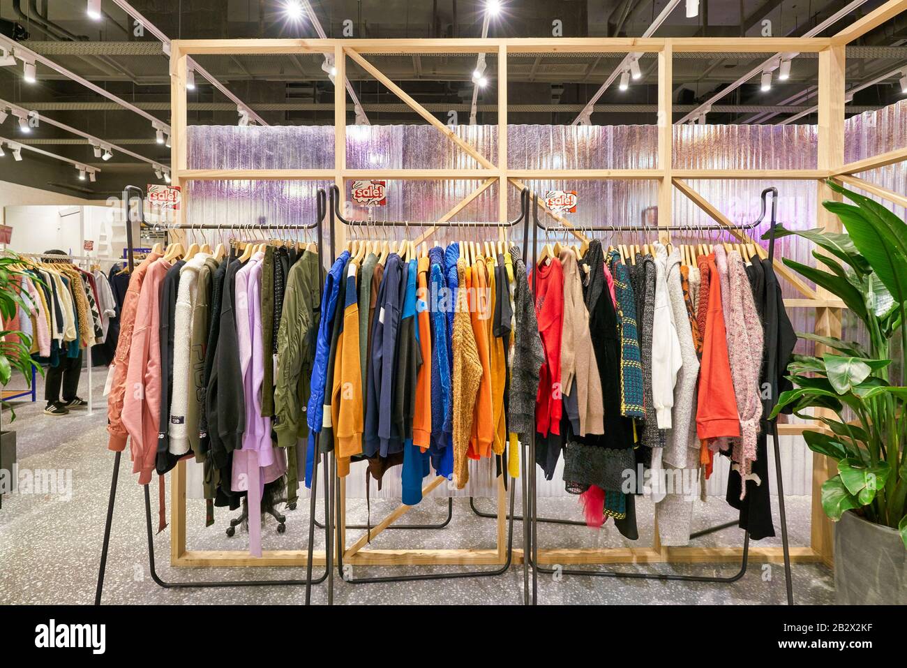 HONG KONG, CHINA - JANUARY 23, 2019: clothes on display at a store in ...